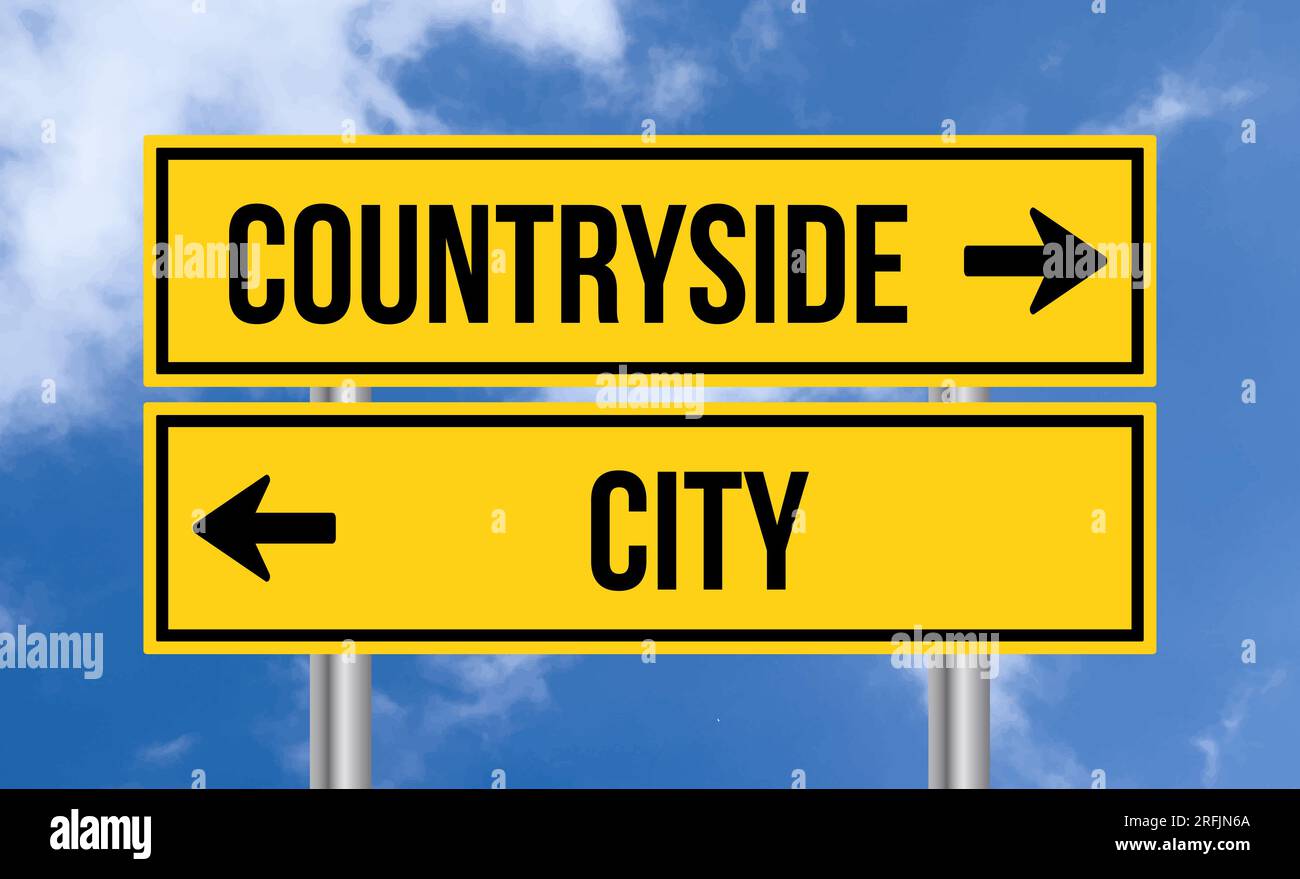 Countryside or city road sign on blue sky background Stock Photo - Alamy