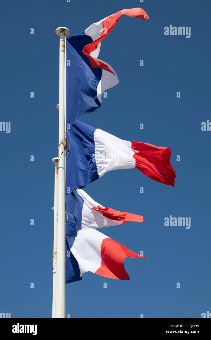 Flags of France 4 flag waving over cloud blue french sky Stock Photo ...