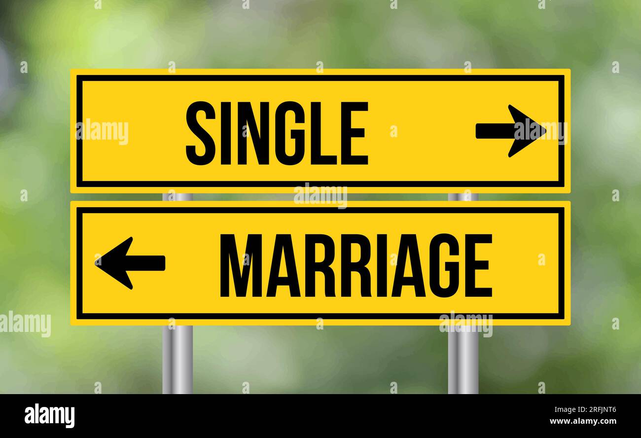 Single or marriage road sign on blur background Stock Photo - Alamy