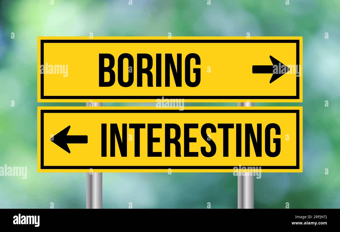 Boring or interesting road sign on blur background Stock Photo - Alamy