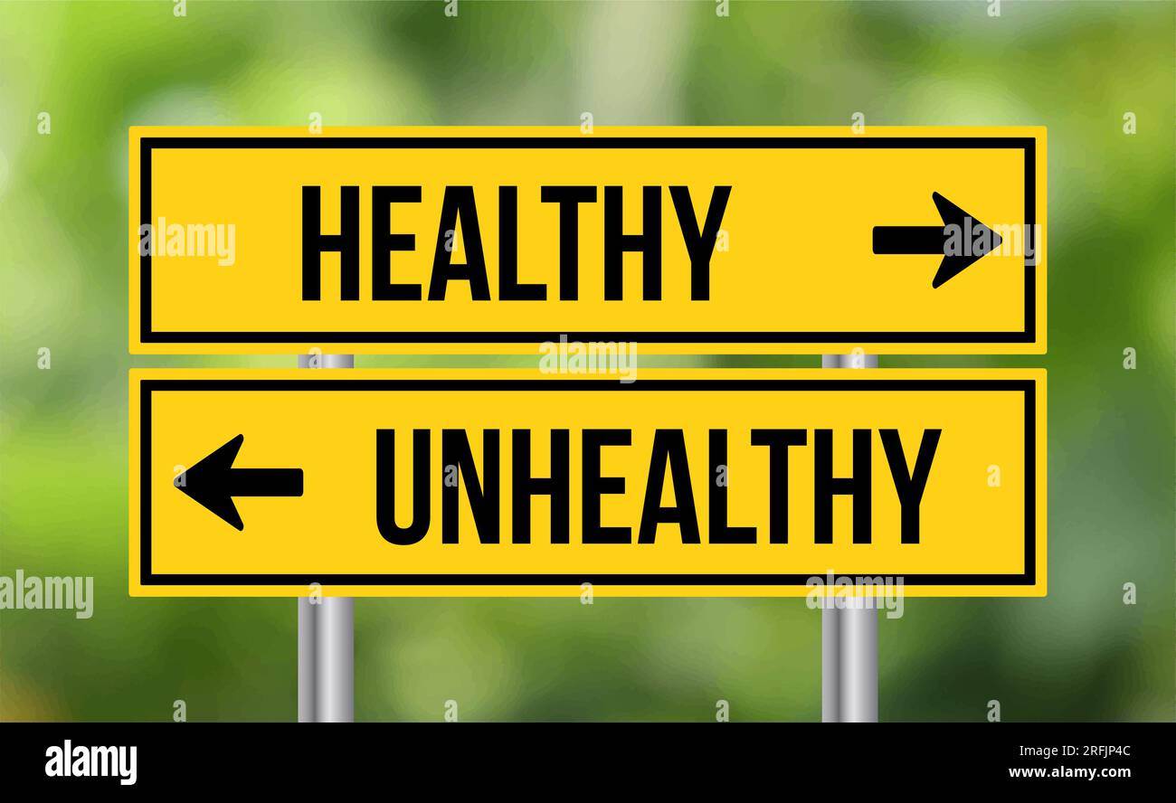 Healthy or unhealthy road sign on blur background Stock Photo - Alamy