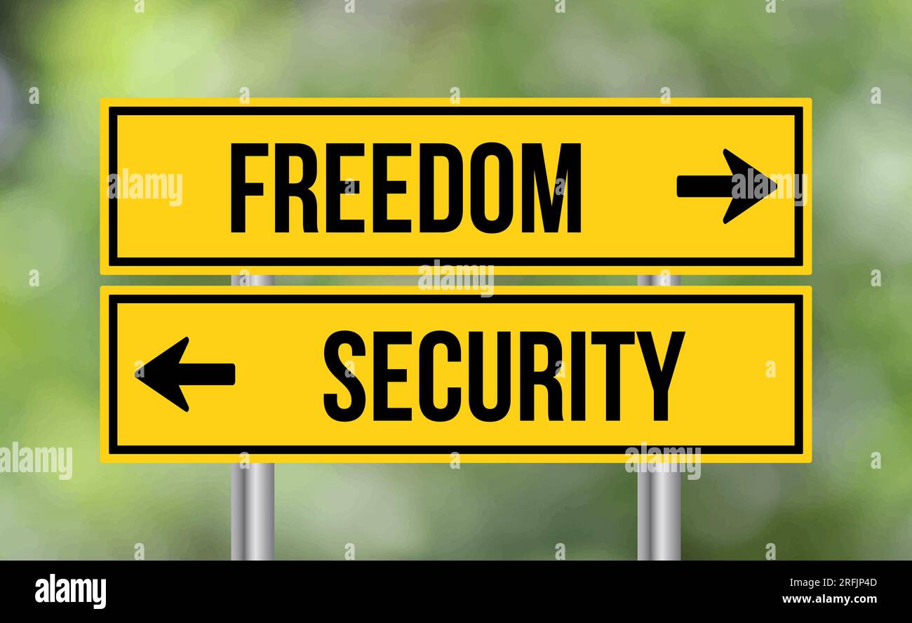 Freedom or security road sign on blur background Stock Photo - Alamy
