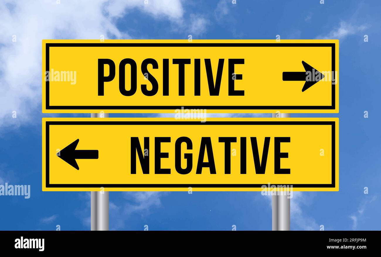 Positive or negative road sign on sky background Stock Photo - Alamy