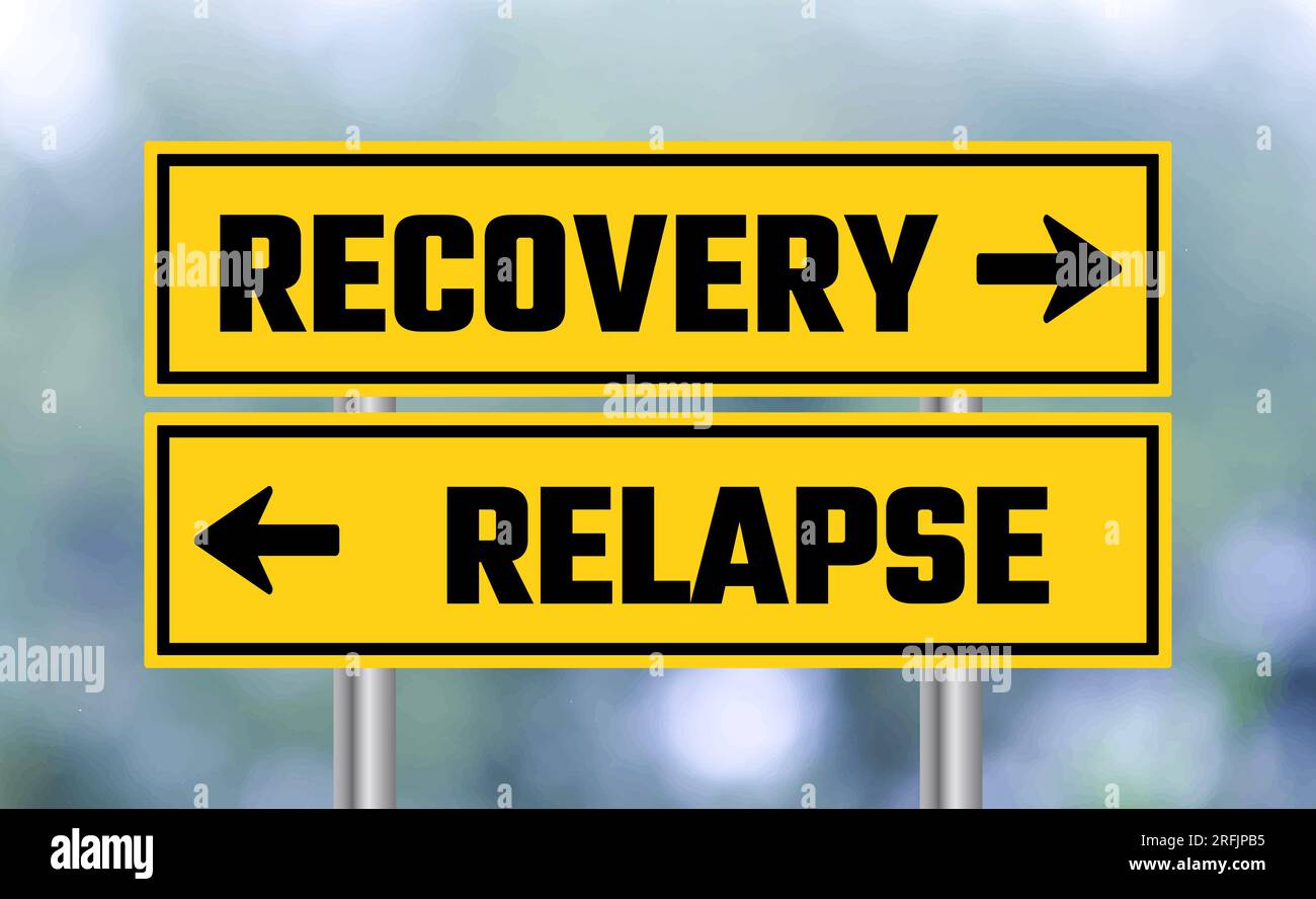 Recovery or relapse road sign on blur background Stock Photo - Alamy