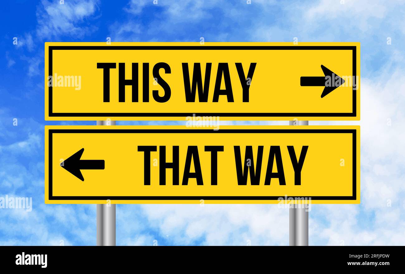 This way or that way road sign on cloudy sky background Stock Photo - Alamy