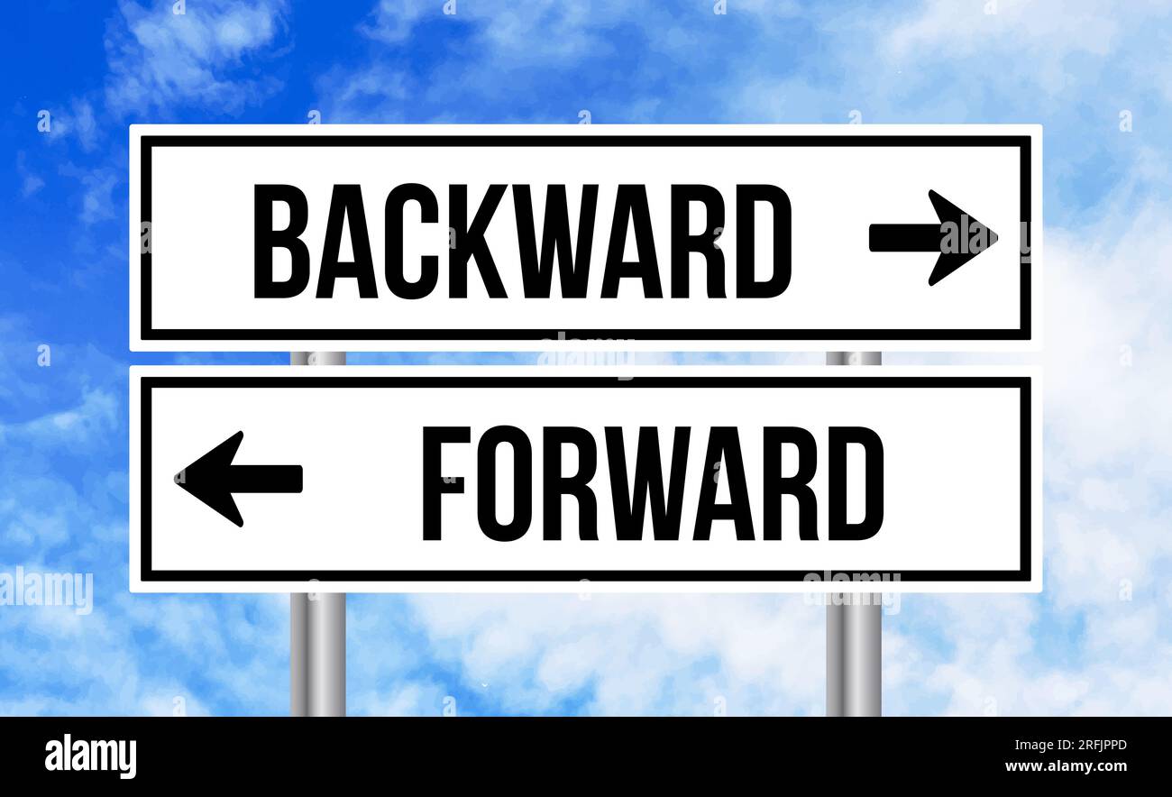 Backward or forward road sign on blue sky background Stock Photo - Alamy
