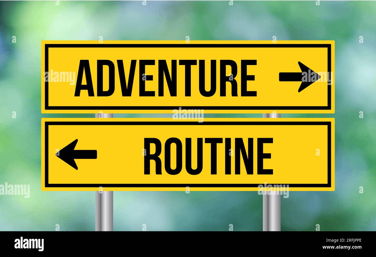 Adventure or routine road sign on blur background Stock Photo - Alamy