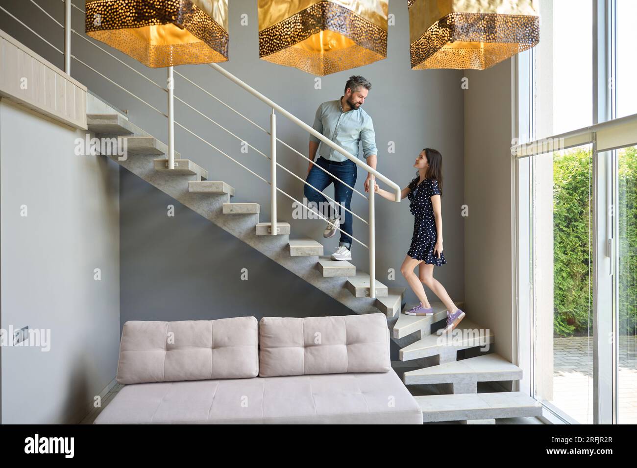 Woman climb stairs home hi-res stock photography and images - Alamy