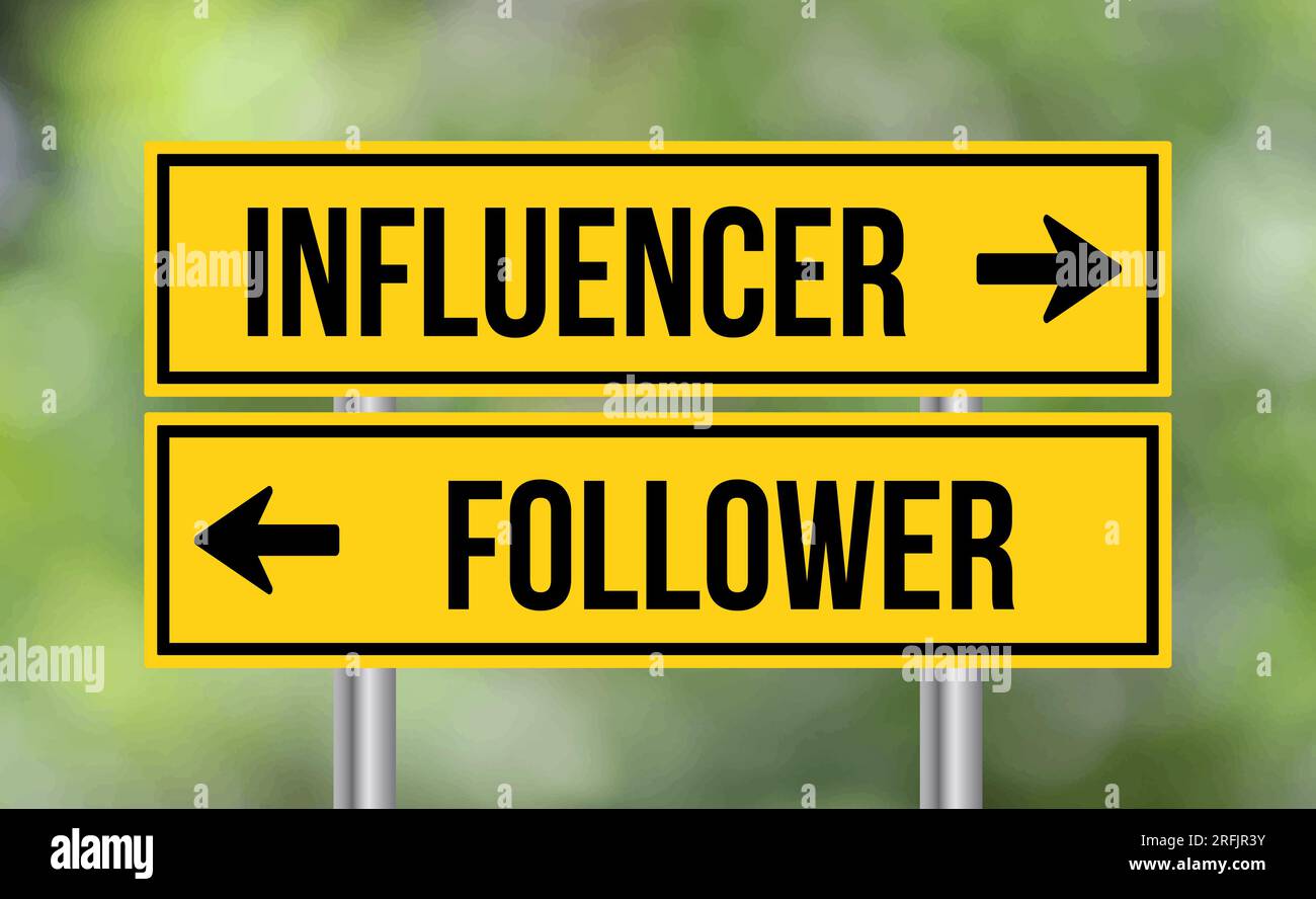 Influencer or follower road sign on blur background Stock Photo - Alamy