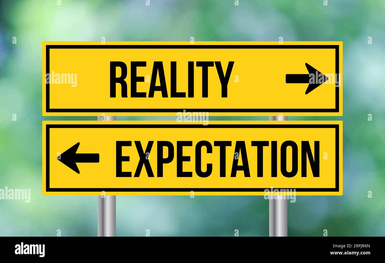 Reality or expectation road sign on blur background Stock Photo - Alamy