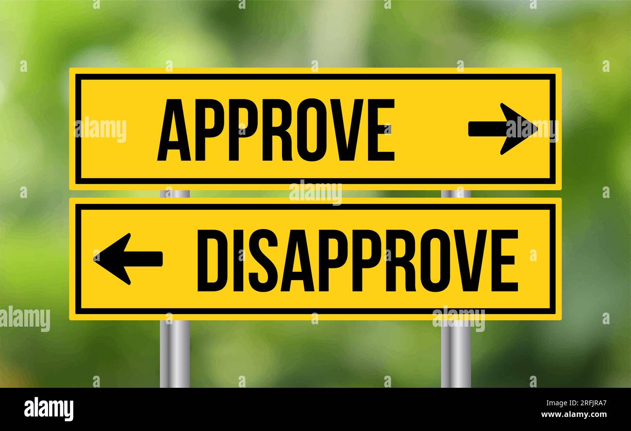 Approve or disapprove road sign on blur background Stock Photo - Alamy