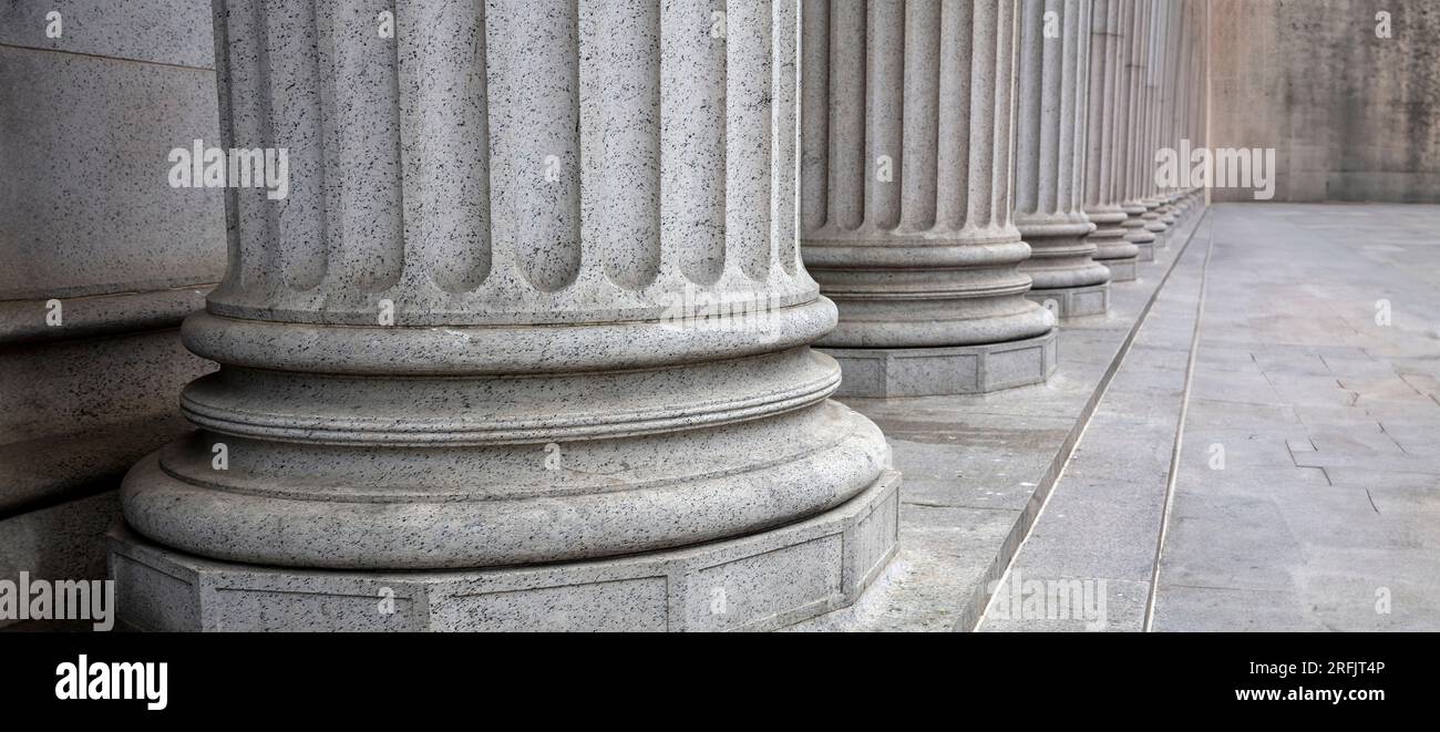 Stone colonnade and stairs detail. Classical pillars row in a building ...