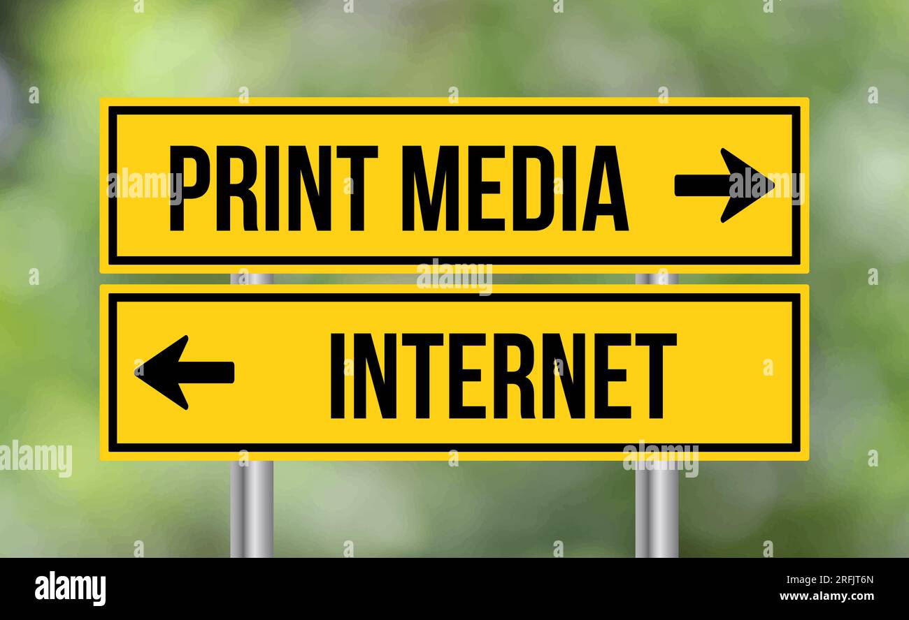 Print media or internet road sign on blur background Stock Photo - Alamy