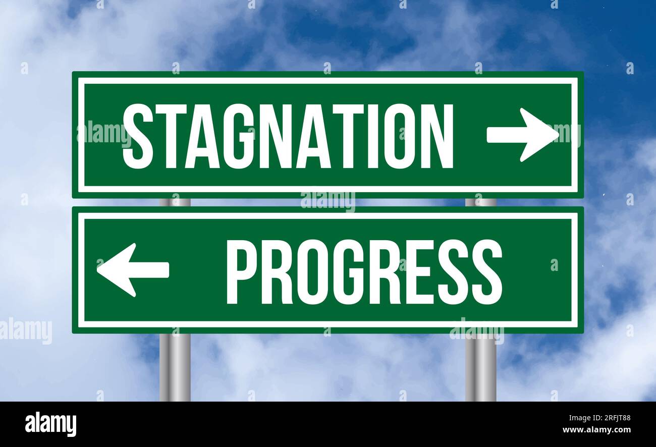 Stagnation or progress road sign on blue sky background Stock Photo - Alamy