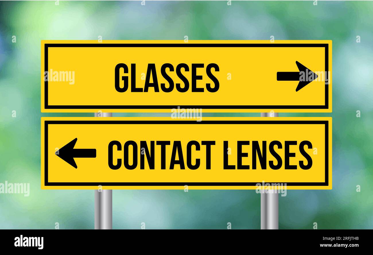 Glasses or contact lenses road sign on blur background Stock Photo - Alamy