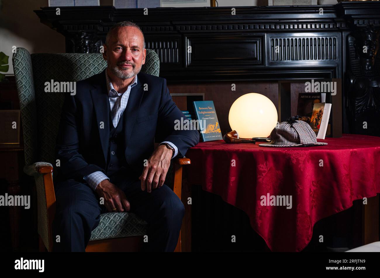 Author and speaker Rob Redenbach poses in the venue of Arthur Conan ...
