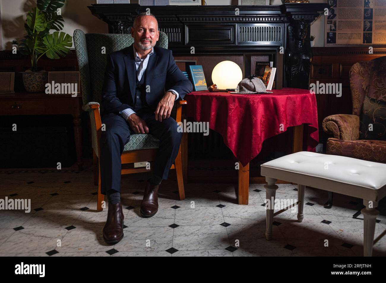 Author and speaker Rob Redenbach poses in the venue of Arthur Conan ...