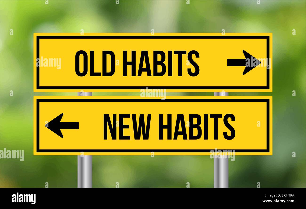 Old habits or new habits road sign on blur background Stock Photo - Alamy
