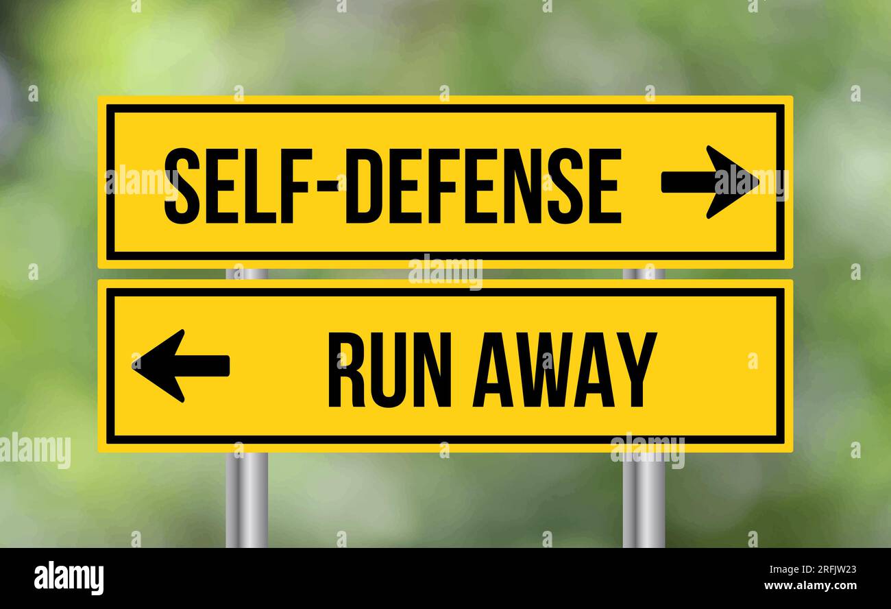 Self defense or run away road sign on blur background Stock Photo - Alamy