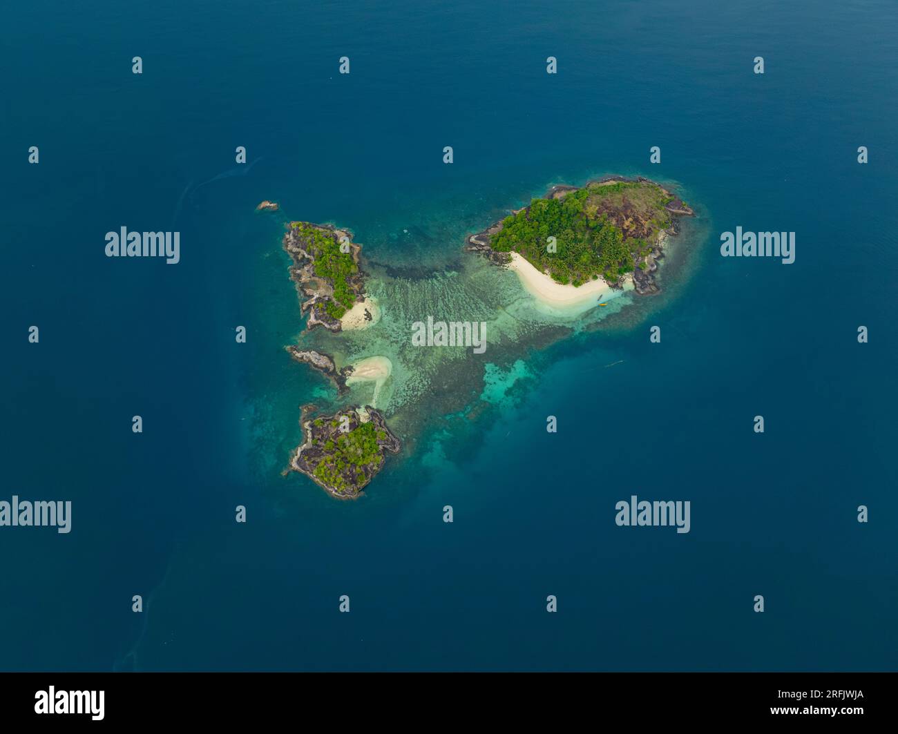 Bisaya-Bisaya Island with white sand beach, small lagoons, and unique ...