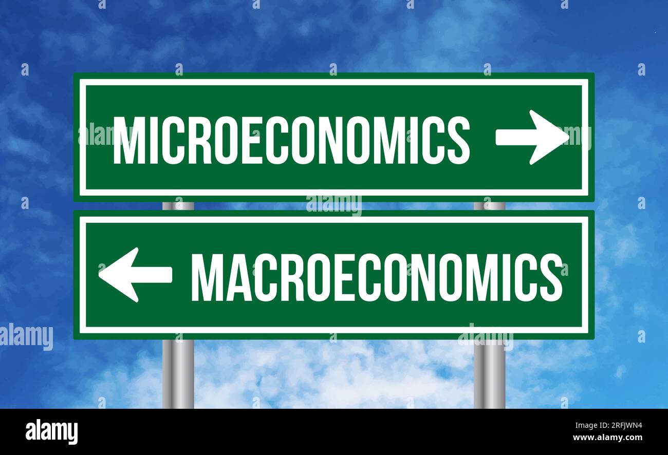 Microeconomics or macroeconomics road sign on cloudy sky background ...