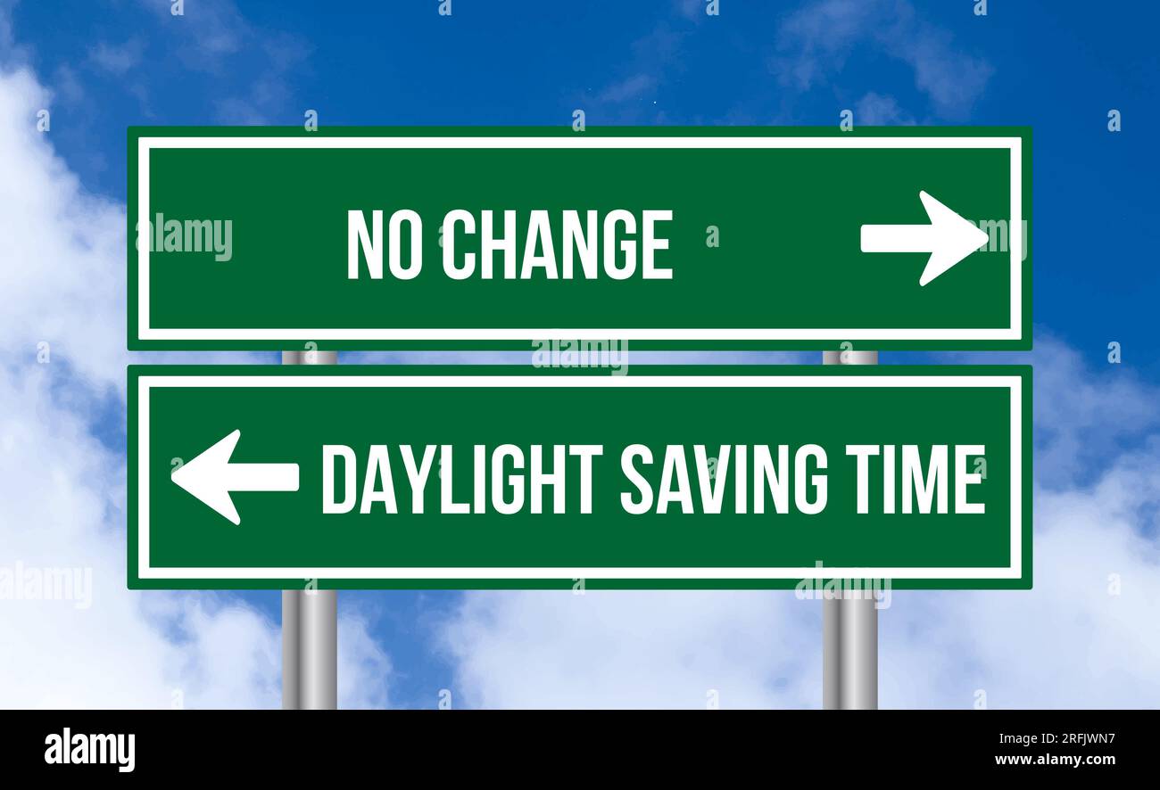 No change or daylight saving time road sign on blue sky background ...