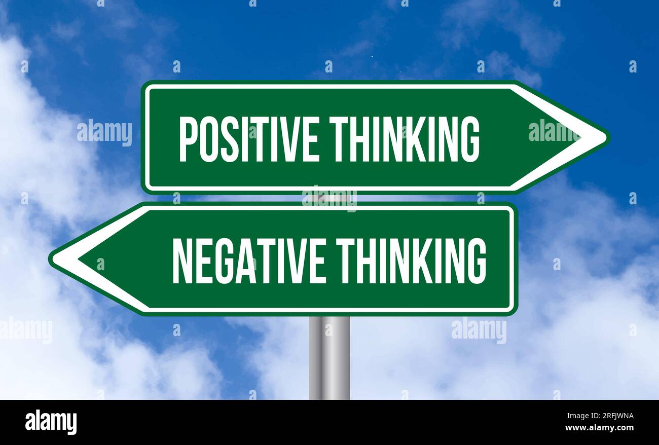 Positive thinking or negative thinking road sign on cloudy sky ...