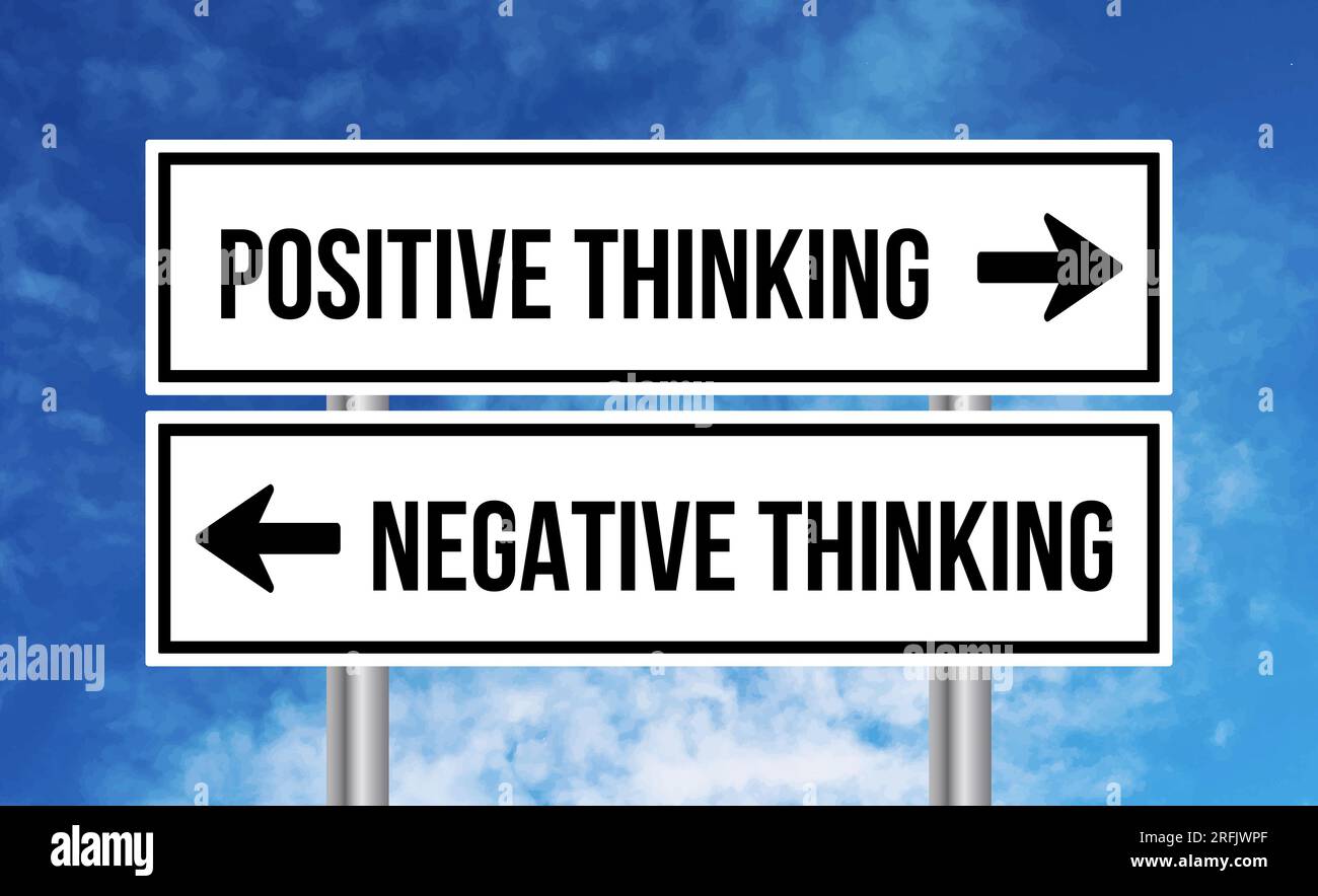 Positive thinking or negative thinking road sign on cloudy sky ...