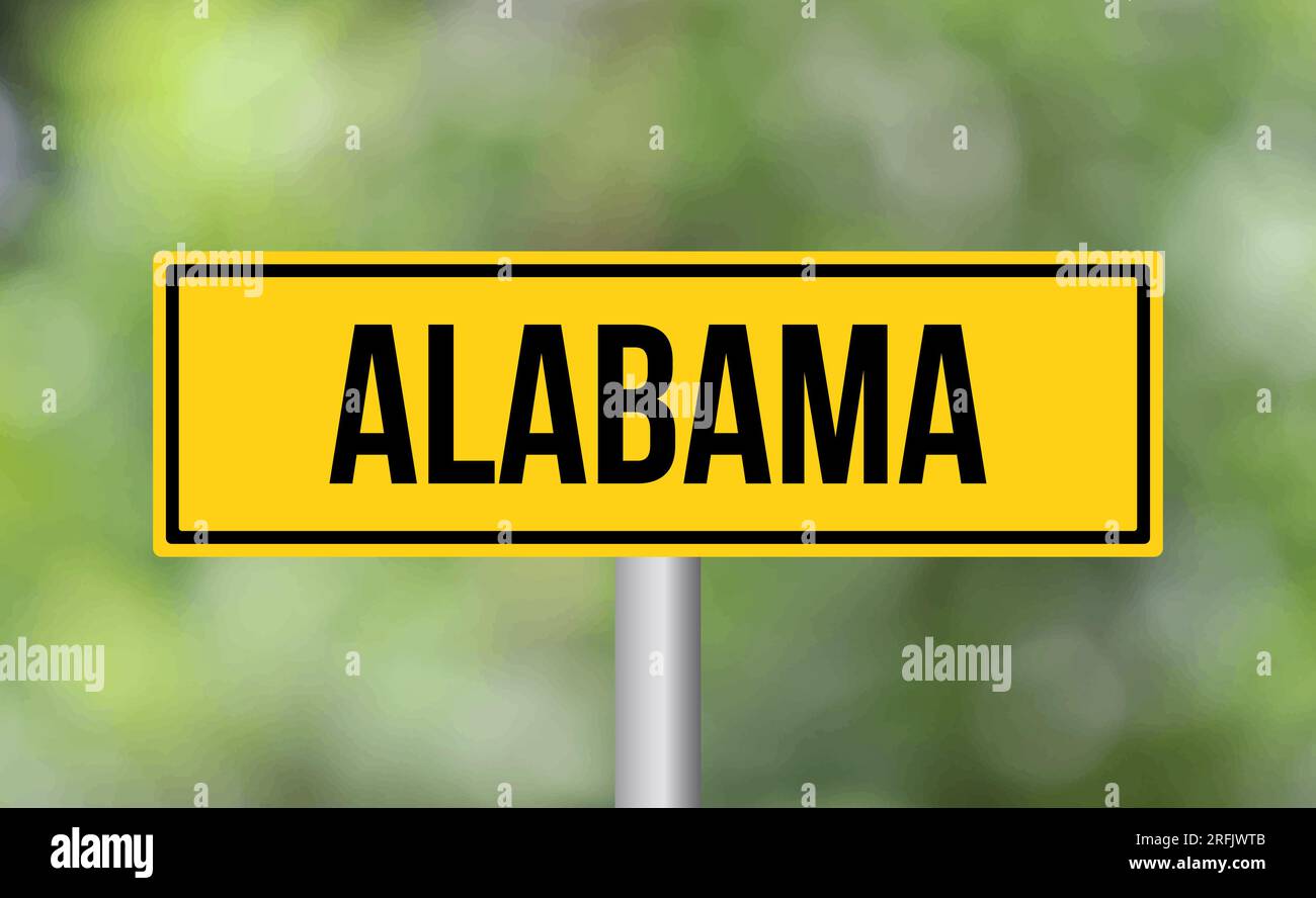 Alabama road sign on blur background Stock Photo - Alamy