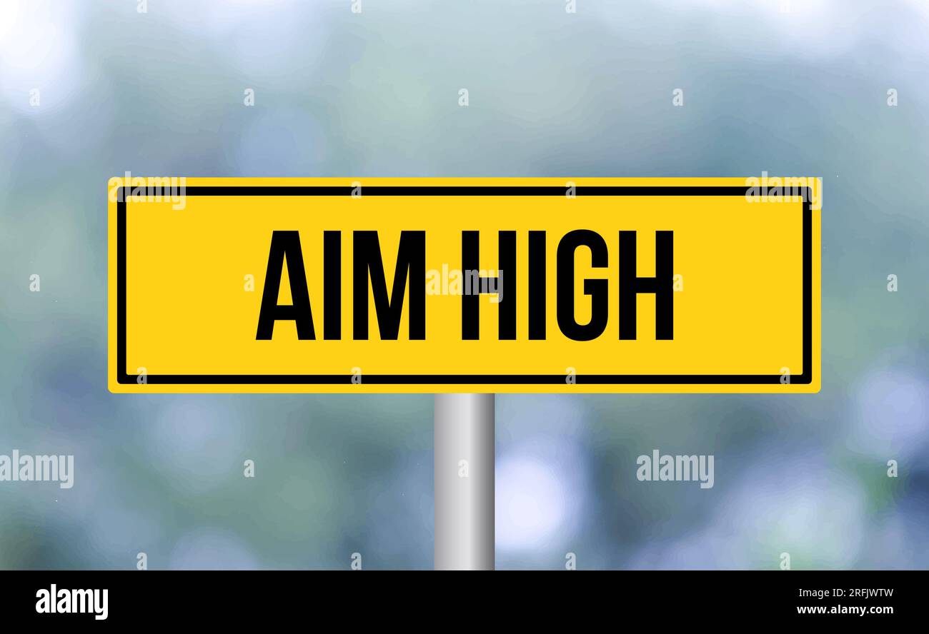 Aim high road sign on blur background Stock Photo - Alamy