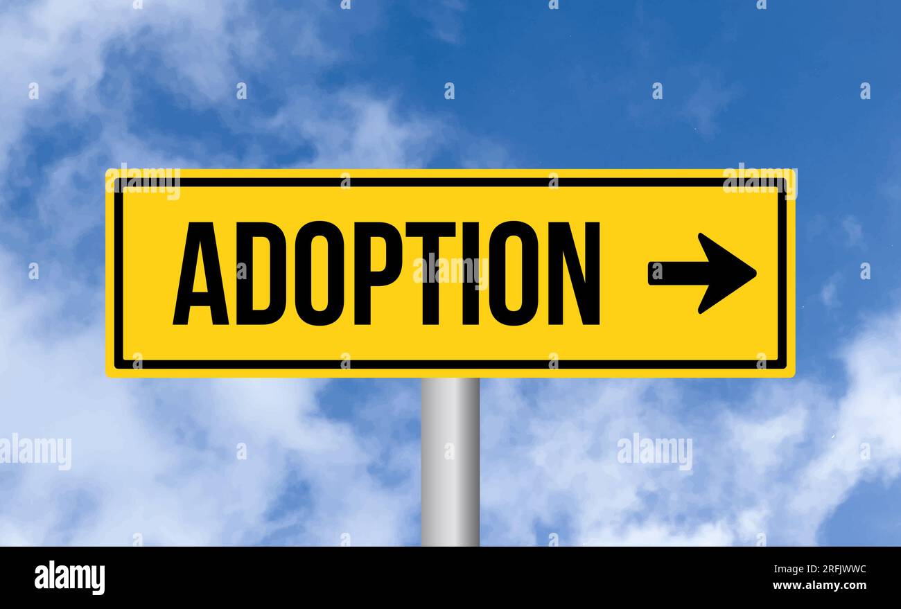 Adoption road sign on cloudy sky background Stock Photo - Alamy