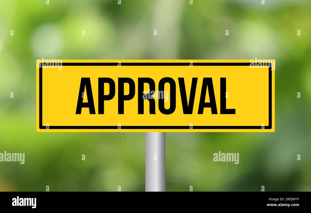 Approval road sign on blur background Stock Photo - Alamy