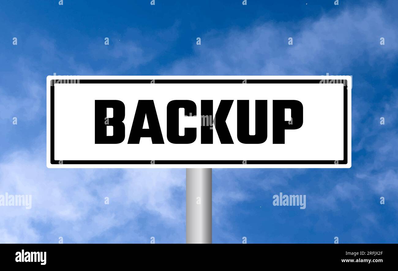 Backup road sign on blue sky background Stock Photo - Alamy