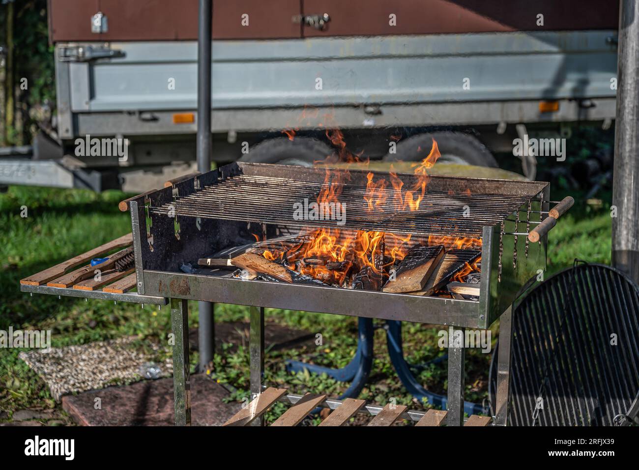 Metal barbecue grill over hot coal. Top view Backdrop for your cooking ...