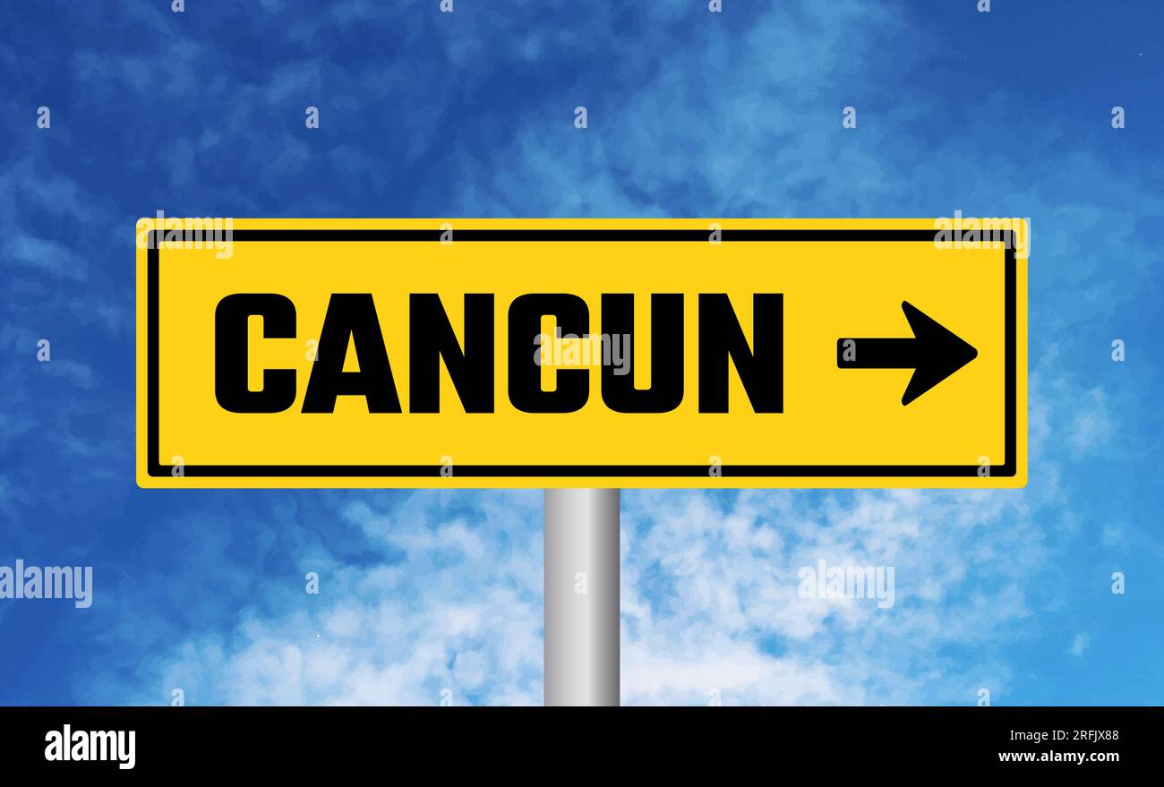 Cancun road sign on cloudy sky background Stock Photo - Alamy