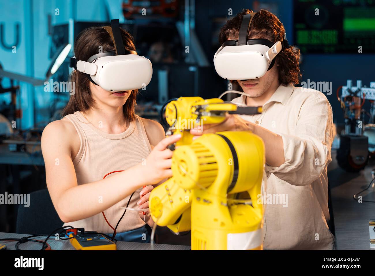 Group young people doing experiments hi-res stock photography and ...