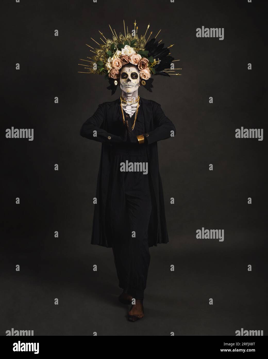 Studio portrait of Drag Queen catrin. Catrin dressed in black with ...