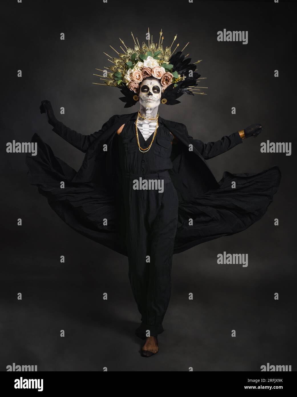 Studio portrait of Drag Queen catrin. Catrin dressed in black with ...