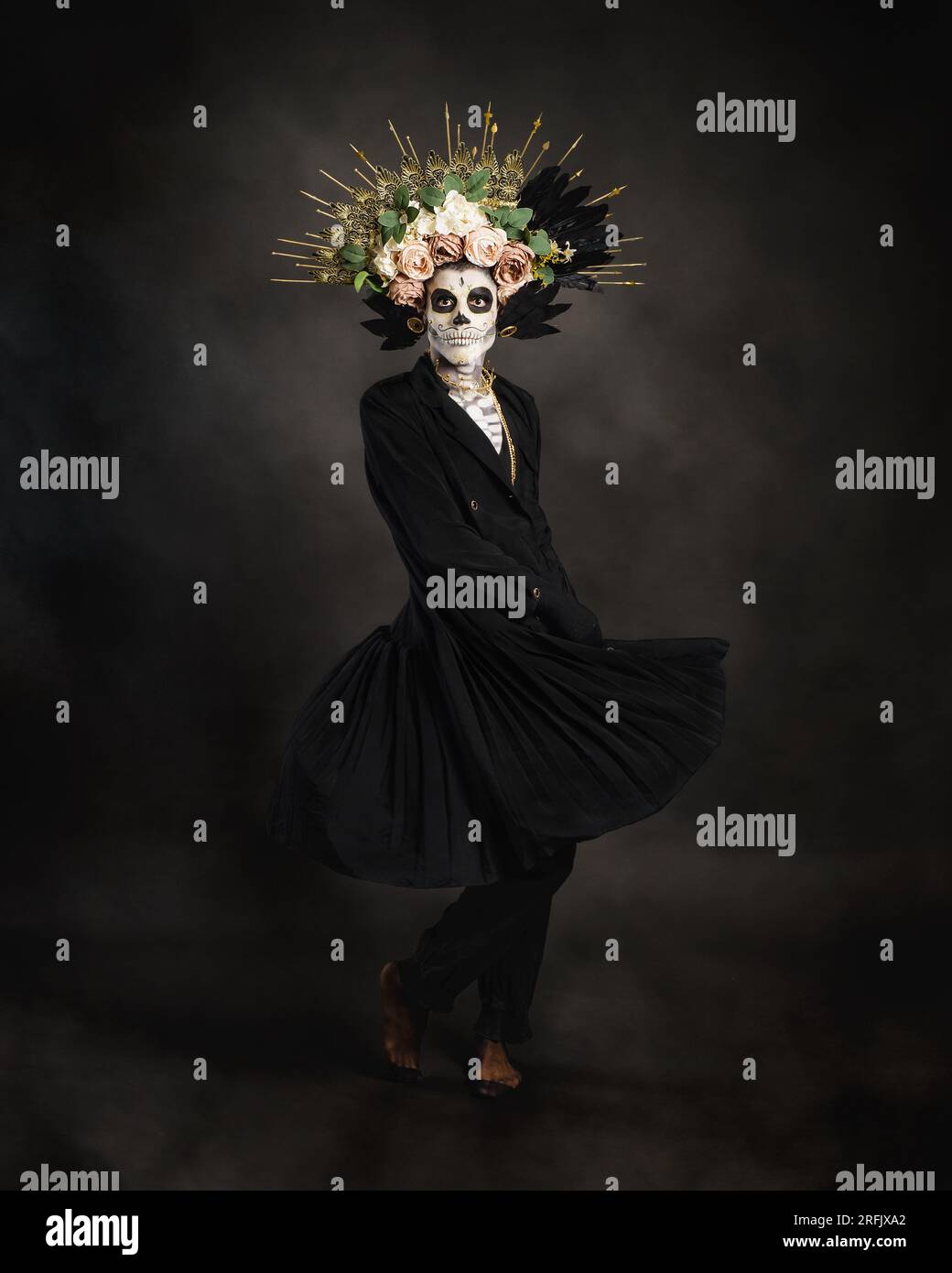 Studio portrait of Drag Queen catrin. Catrin dressed in black with ...