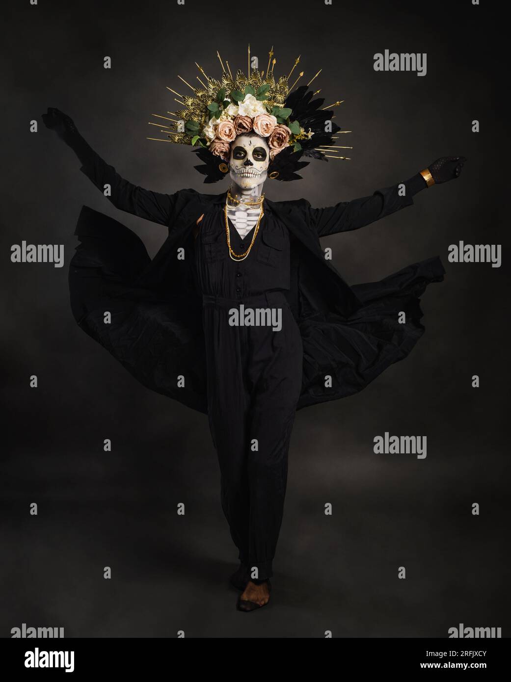 Studio portrait of Drag Queen catrin. Catrin dressed in black with ...