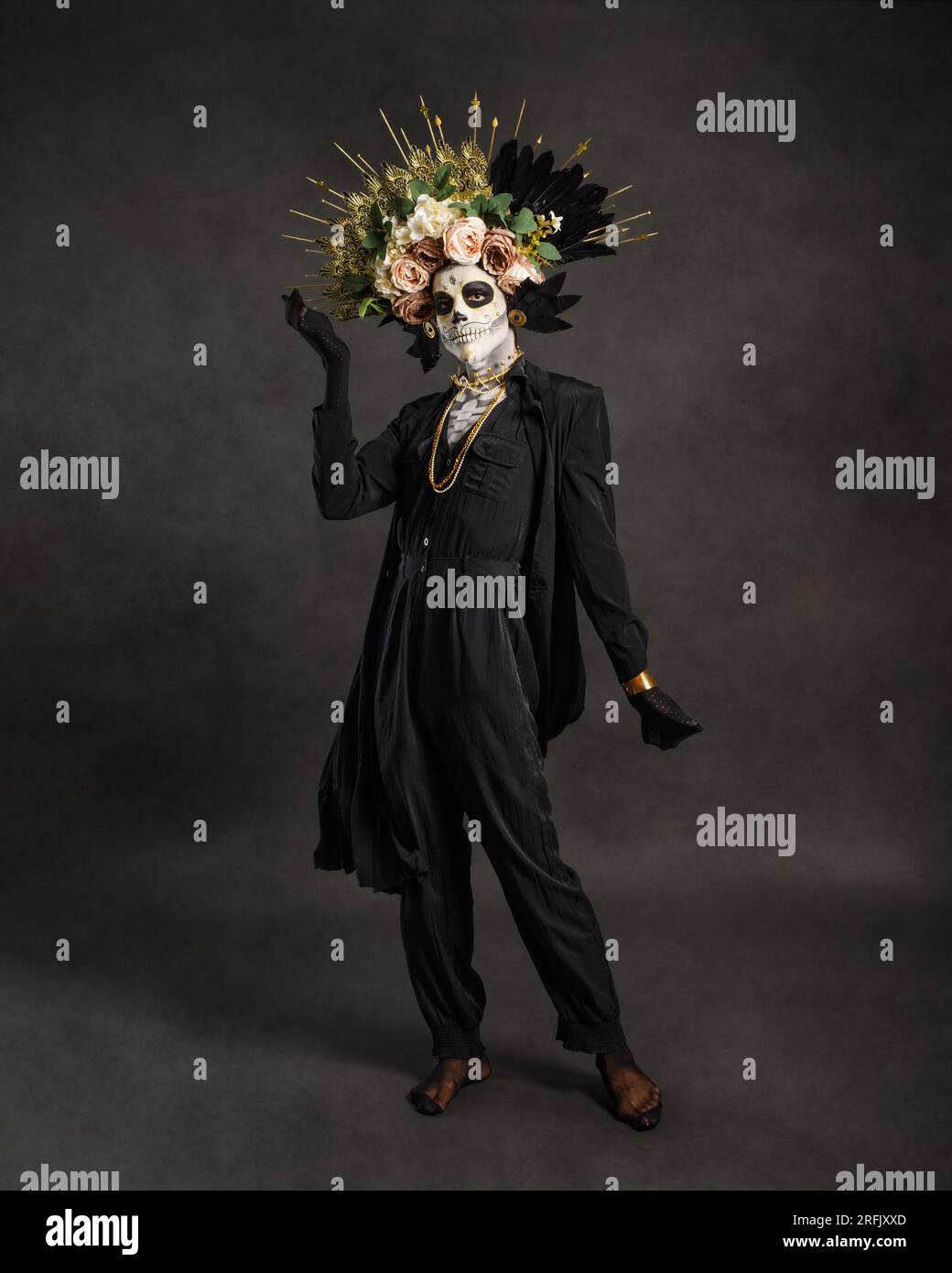 Studio portrait of Drag Queen catrin. Catrin dressed in black with ...