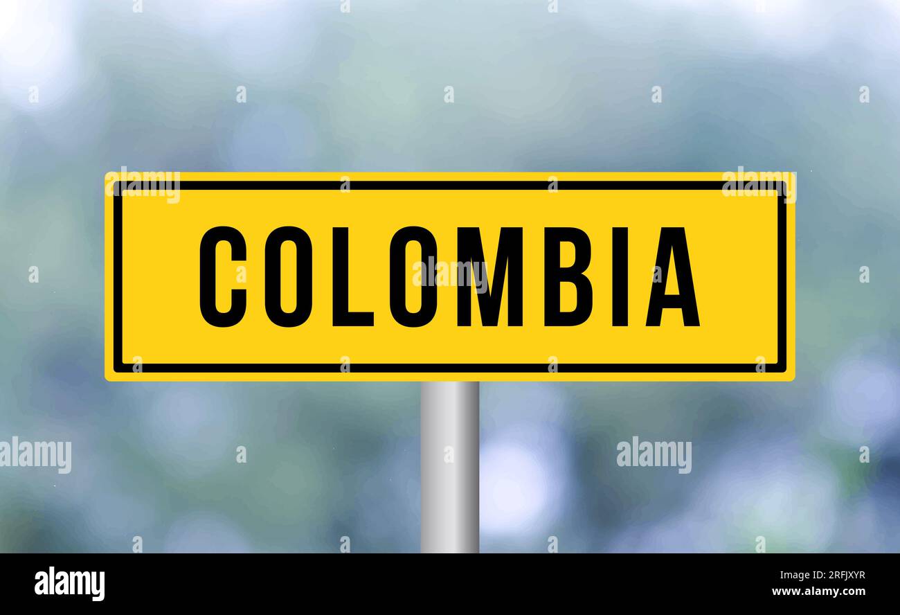 Colombia road sign on blur background Stock Photo - Alamy
