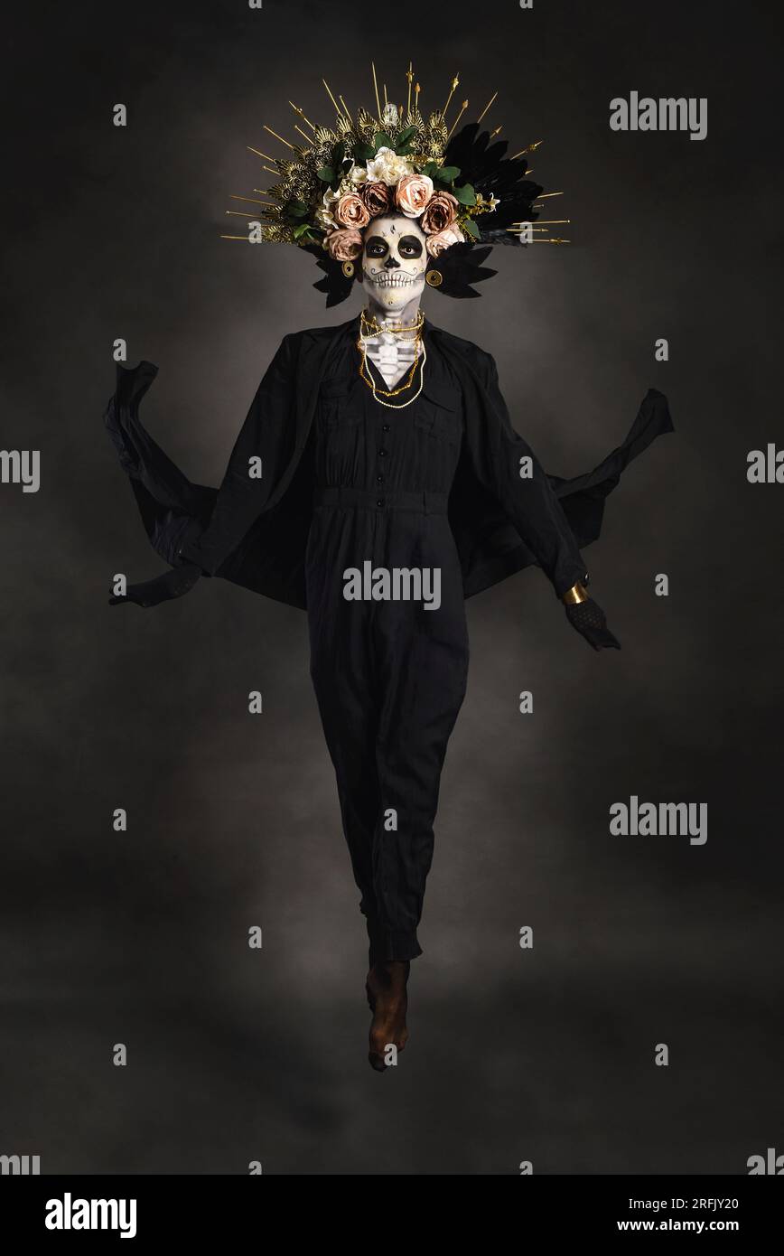 Studio portrait of Drag Queen catrin. Catrin dressed in black with ...