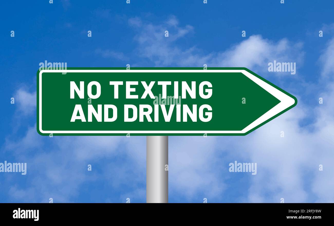 No texting and driving road sign on blue sky background Stock Photo - Alamy