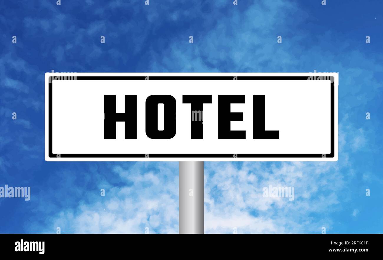 Hotel road sign on sky background Stock Photo - Alamy
