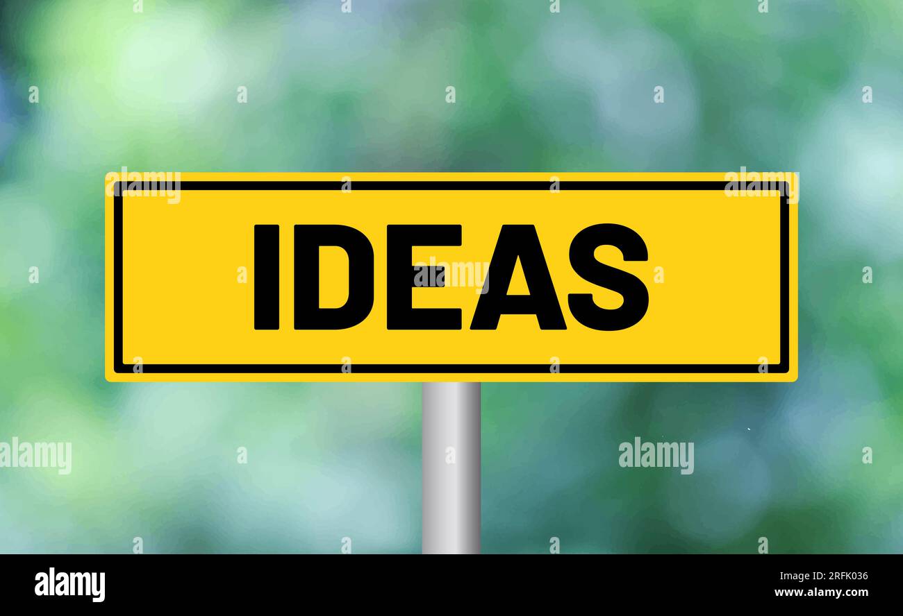 Ideas road sign on blur background Stock Photo - Alamy