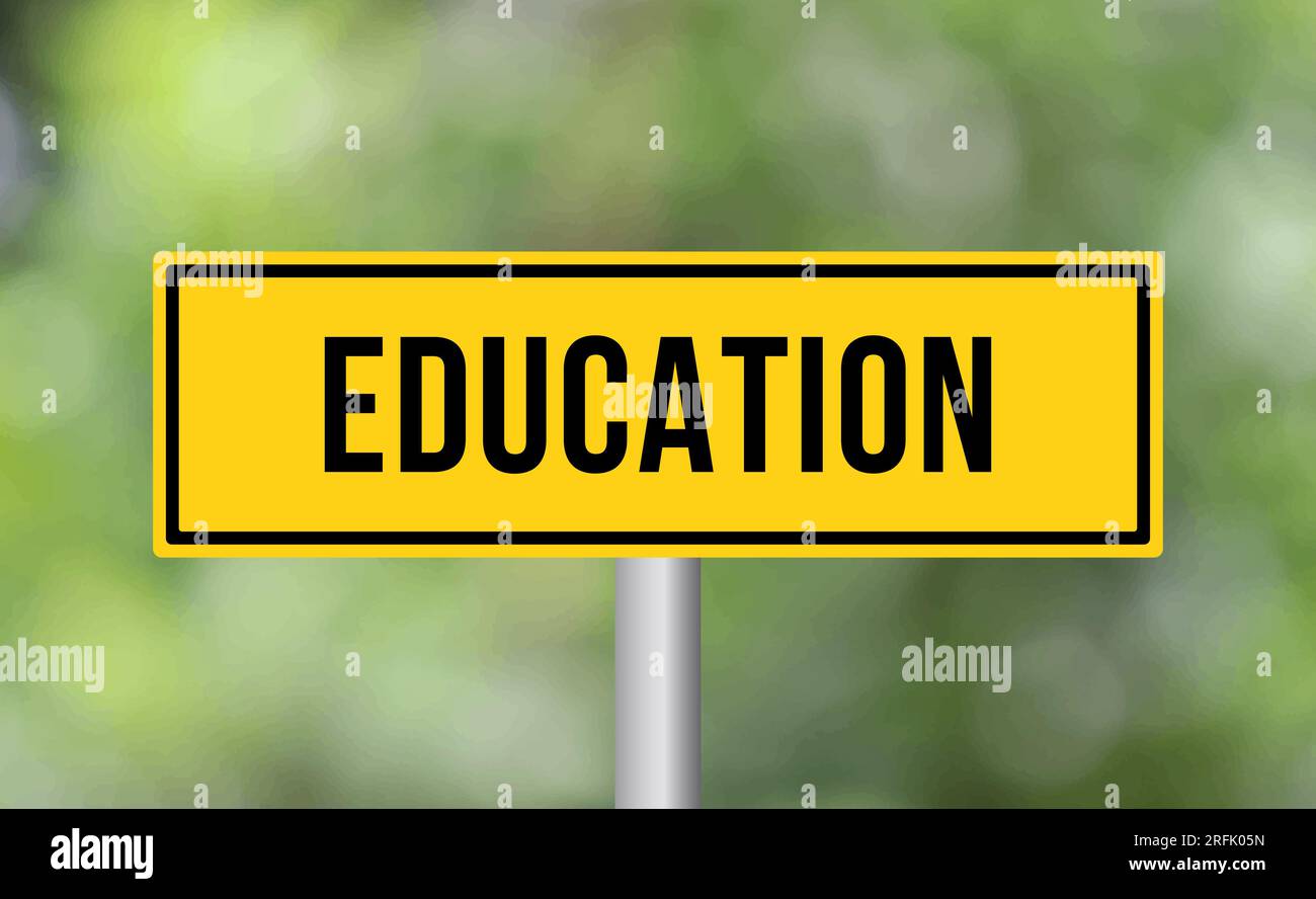 Education road sign on blur background Stock Photo - Alamy