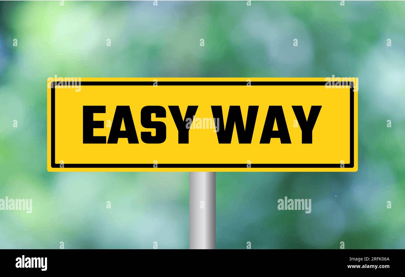 Easy way road sign on blur background Stock Photo - Alamy