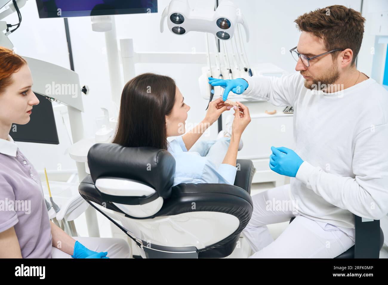 Doctor and patient talking about different ways of prosthetics Stock ...