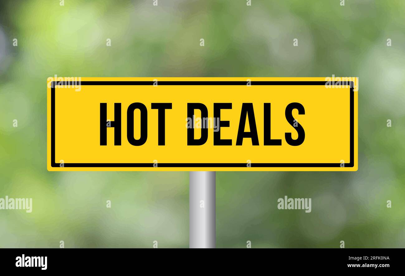 Hot deals road sign on blur background Stock Photo - Alamy